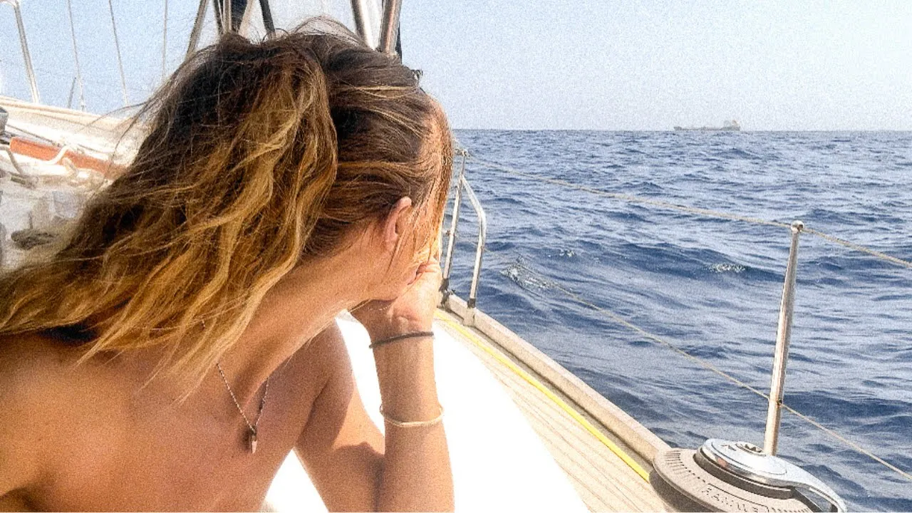 GIRL SOLO-sailing; 2 raw & real days on a 51' sailboat with DOLPHINS! [ep 15] | WeBoating.com